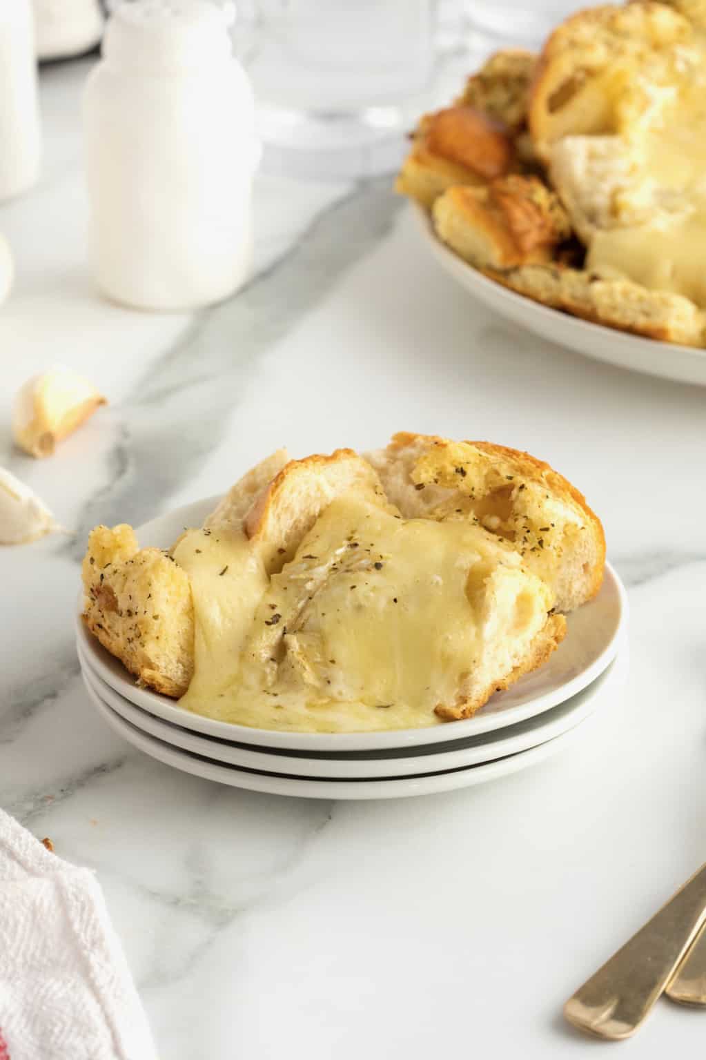 Garlic Butter Baked Brie in a Bread Bowl - The BakerMama